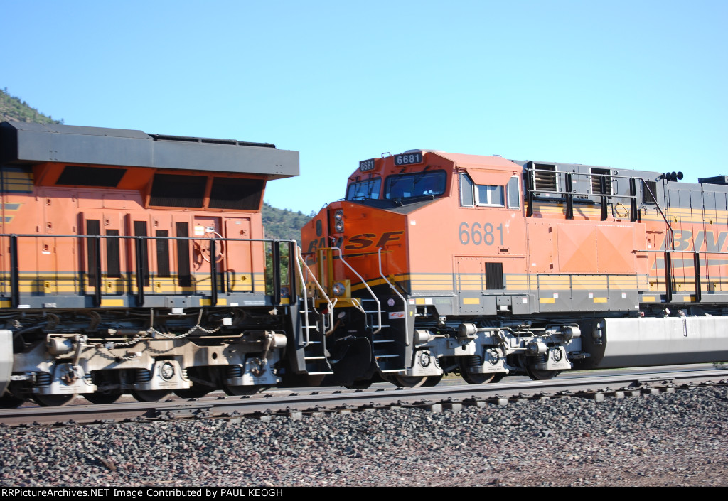 BNSF 6681 rolls eastward pulling a Z towards Winslow, AZ, as #3 unit.